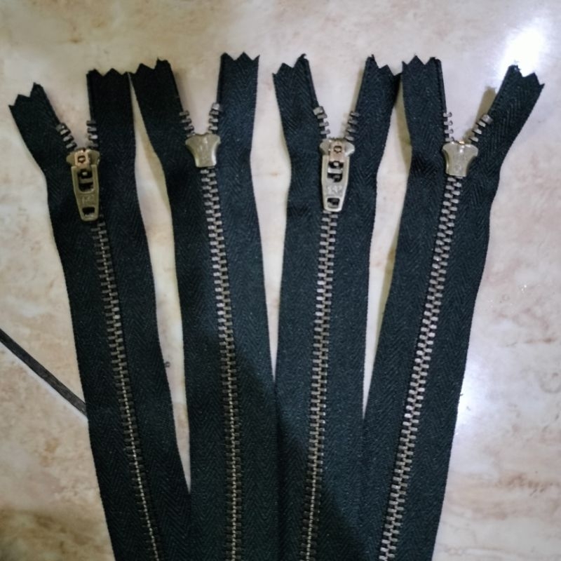 Jual Resleting/Zipper Besi bakar YKK No. 4,5 (kepala tipis) | Shopee ...