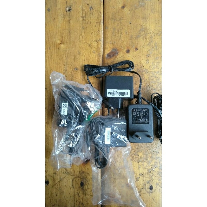 Jual Adaptor bawaan ont dan stb kondisi baru 12V- 1A | Shopee Indonesia