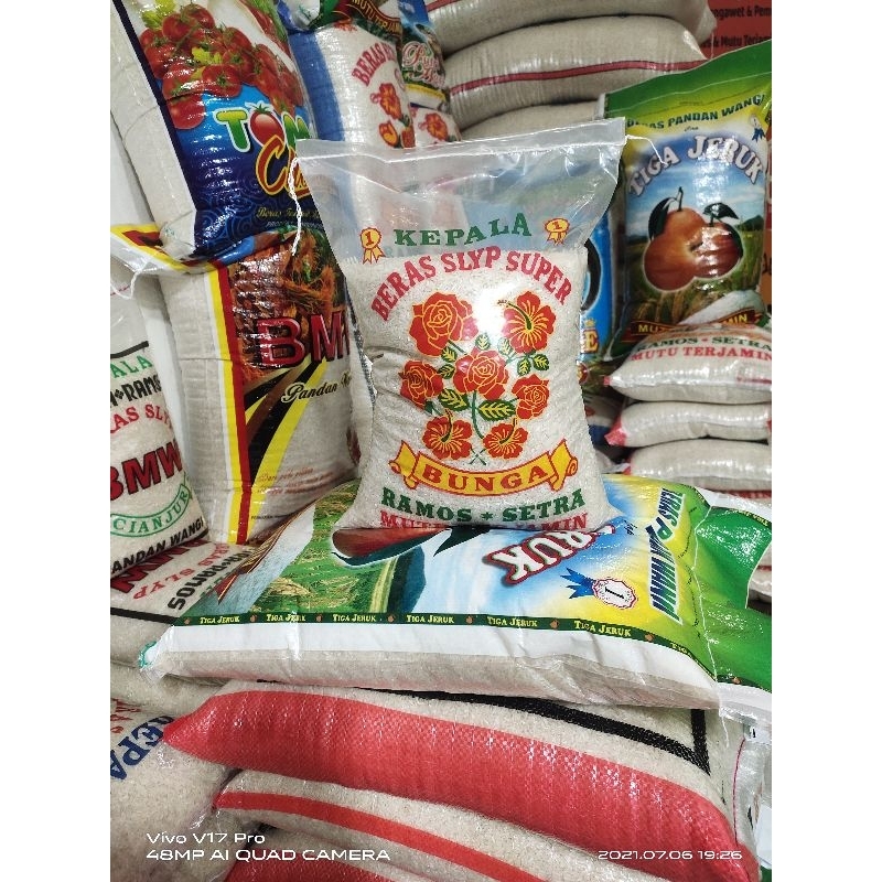 Jual BERAS CAP BUNGA AA 3KG RAMOS SLYP | Shopee Indonesia