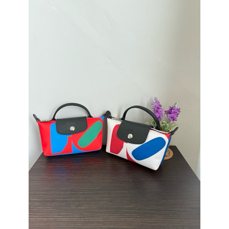Jual BRAND NEW Longchamp x Robert Indiana Pouch | Shopee Indonesia