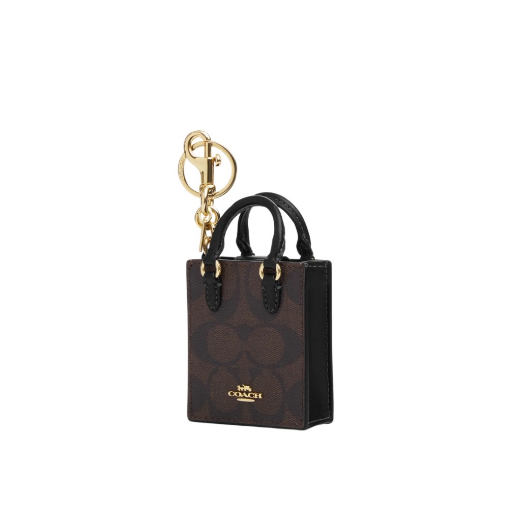 Jual COACH North/South Mini Tote Bag Charm In Signature Canvas Brown ...