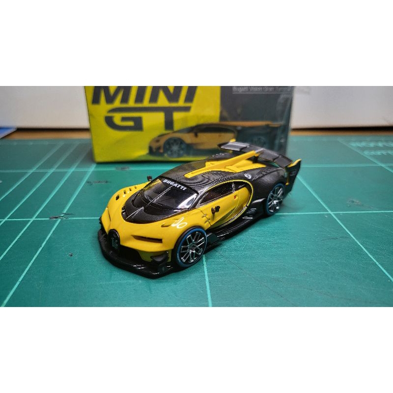 Jual Mini GT Bugatti Vision Gran Turismo yellow | Shopee Indonesia