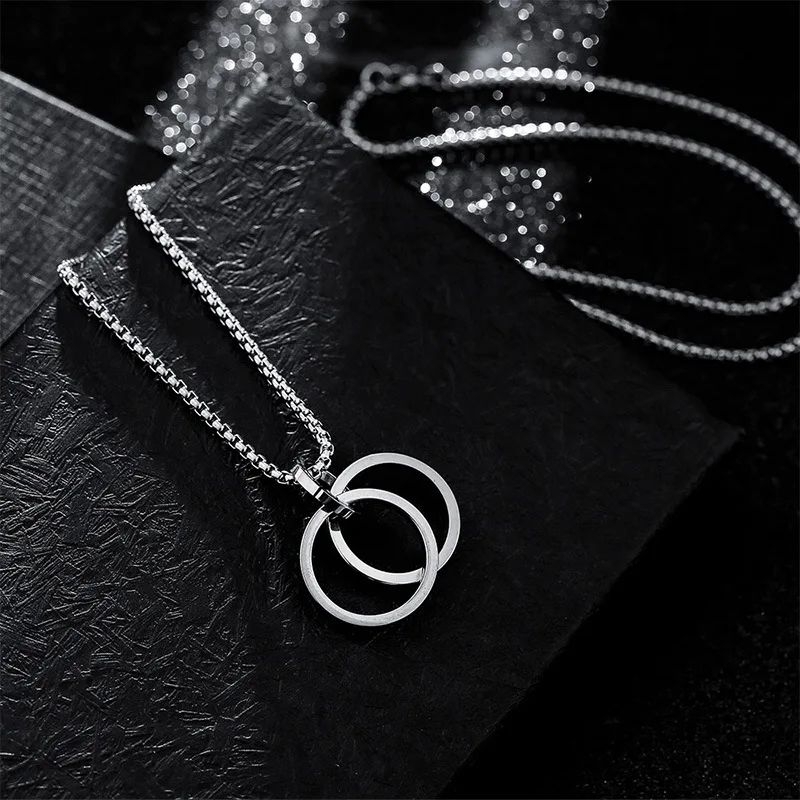 Jual KALUNG TITANIUM PRIA ANTI KARAT MODEL DOUBLE LIONTIN | Shopee ...