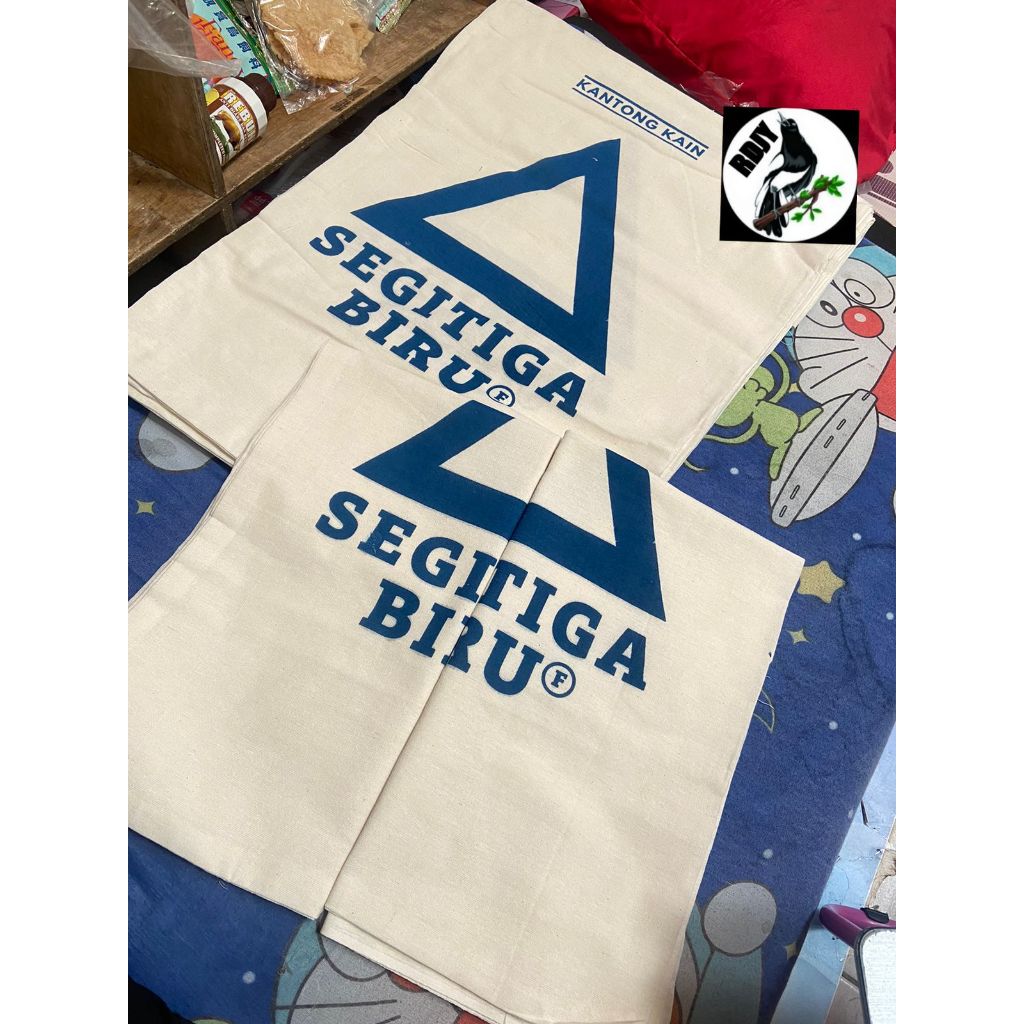 Jual KANTONG SEGITIGA BIRU KAIN PUTIH KARUNG GANDUM CAP SEGITIGA BIRU ...