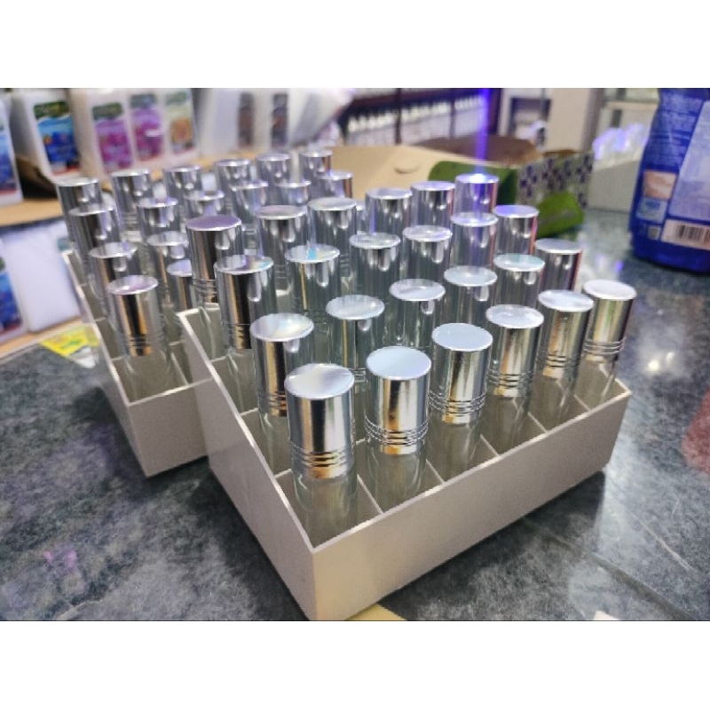 Jual Rak Botol Parfum Rol On Tatakan Botol Parfum Rol On | Shopee Indonesia