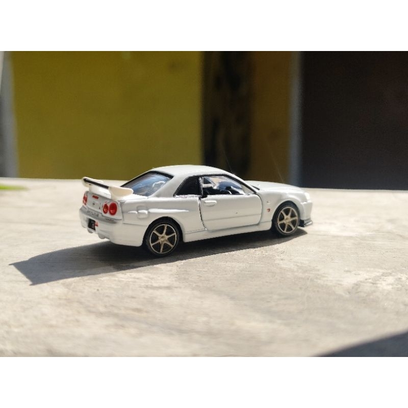 Jual Tomica Premium Nissan GTR R34 V Spec II Nur 1/64 | Shopee Indonesia