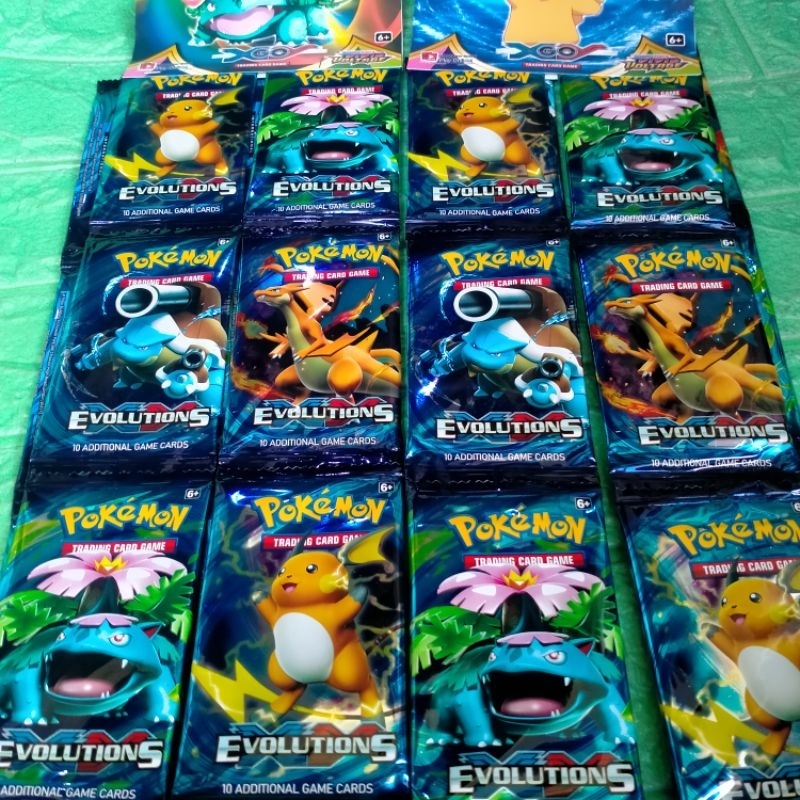 Jual 12 Sachet Mainan Kartu gambar Pokemon New Trading Card Terbaru ...