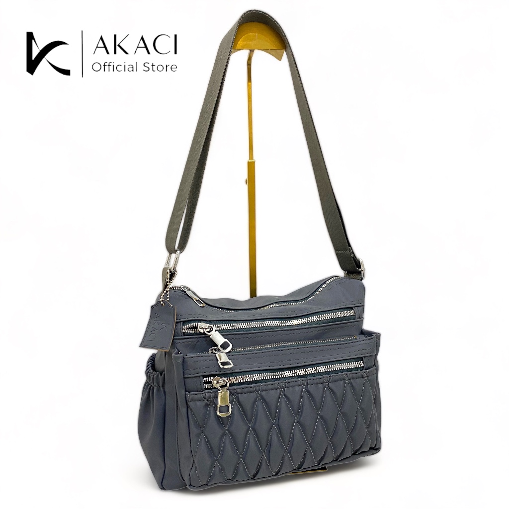 Jual Akaci - BUCHI Tas selempang wanita 09-8194 Bahan Nilon 6 ruang ...