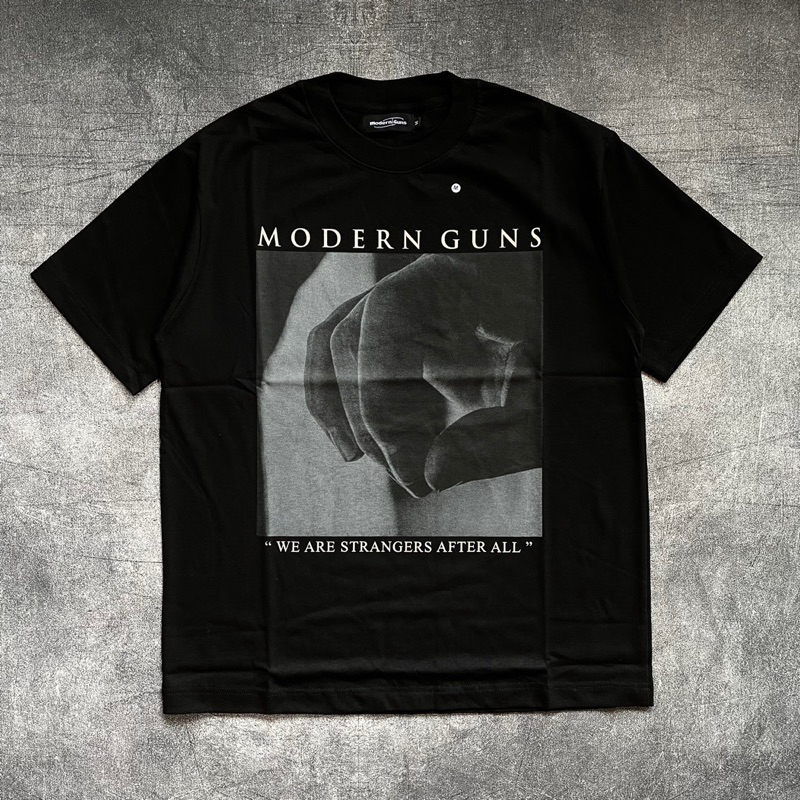Jual Tshirt MODERN GUNS - WE ARE STRANGERS Official Merchandise | Shopee Indonesia