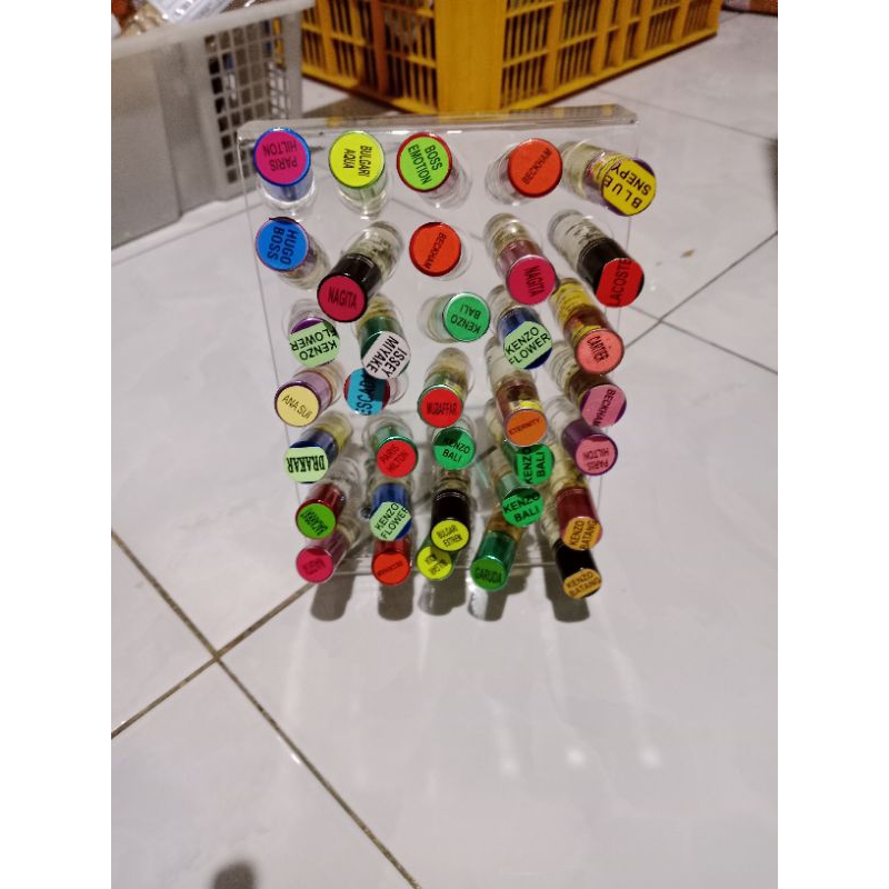 Jual Display parfum acrilik model tegak utk botol roll on, diameter 2,2 ...