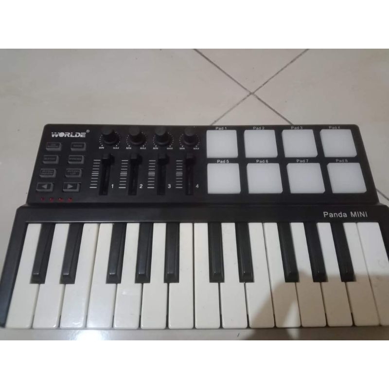 Jual Panda Mini Piano Digital 25 key + Drum Pad MIDI Controller WORLDE ...