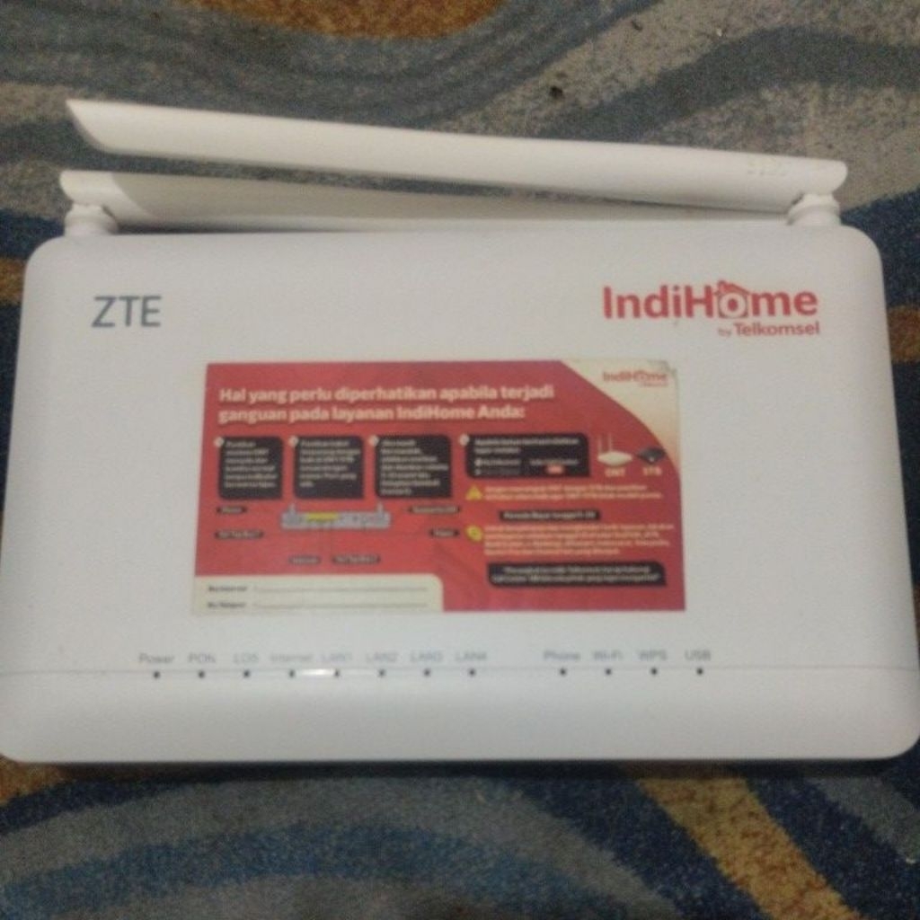 Jual ZTE F670L port biru plus adaptor | Shopee Indonesia