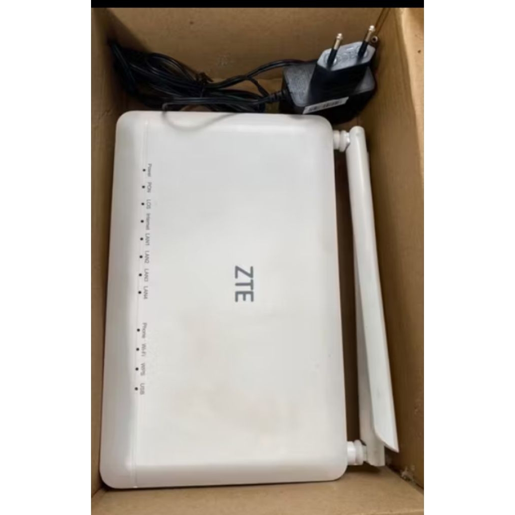 Jual Router modem zte F670L port biru mesin normal tapi antenna patah ...