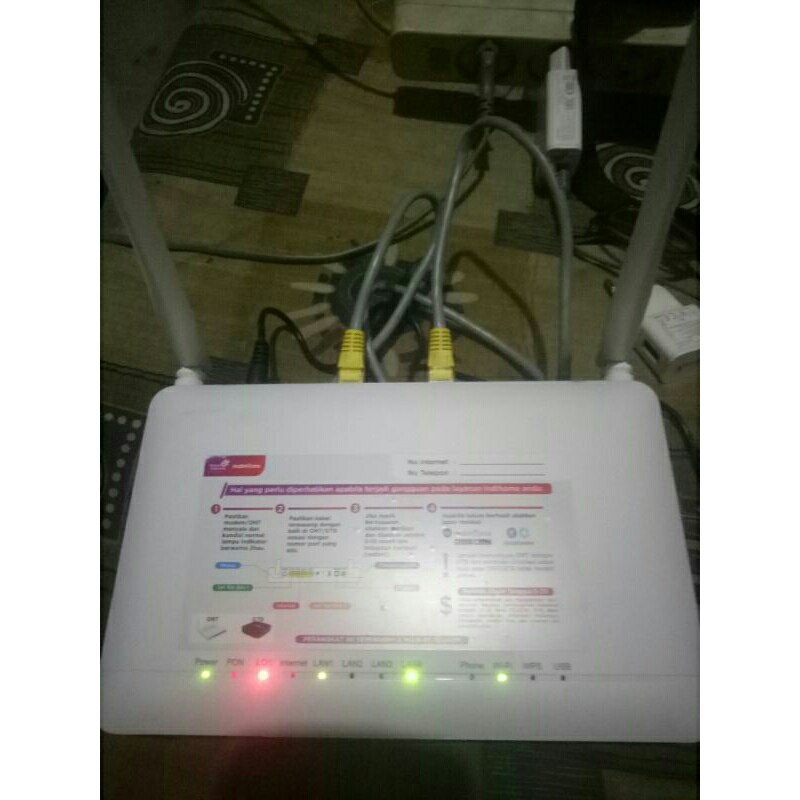 Jual Router ZTE F670L port biru lengkap adaptor + kabel LAN, garansi ...