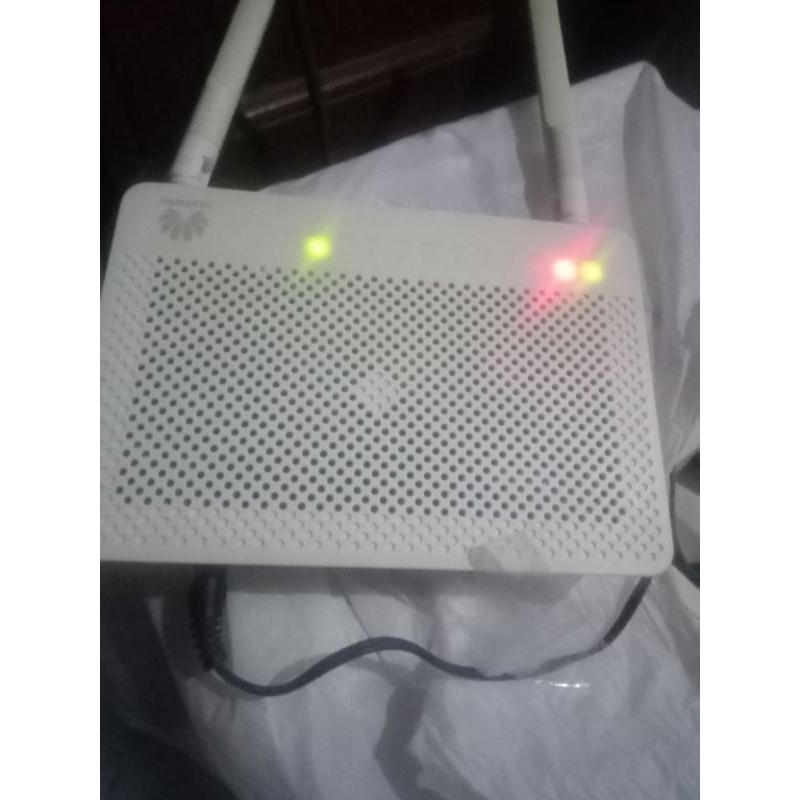 Jual jual modem wifi merk huawey HG8245H5 plus adaptor port hijau ...