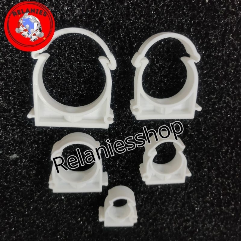 Jual klem pipa conduit pipa clamp /klem tipe o pipa pvc | Shopee Indonesia