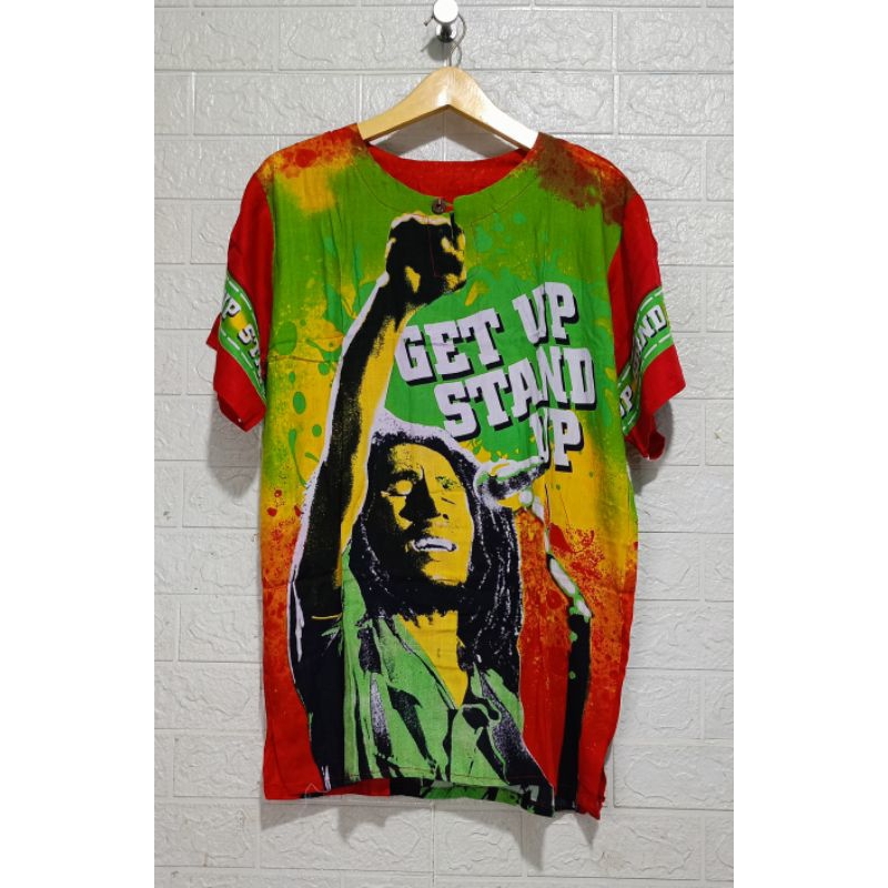 Jual Baju Kaos gambar bobmarley/Kaos reggae mania/COD Kaos pantai Pria ...