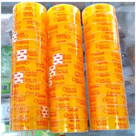 Jual SATU SLOP ISOLASI BENING TEBAL ISOLASI KECIL ORLEE 25 Yard isi 12 pcs | Shopee Indonesia