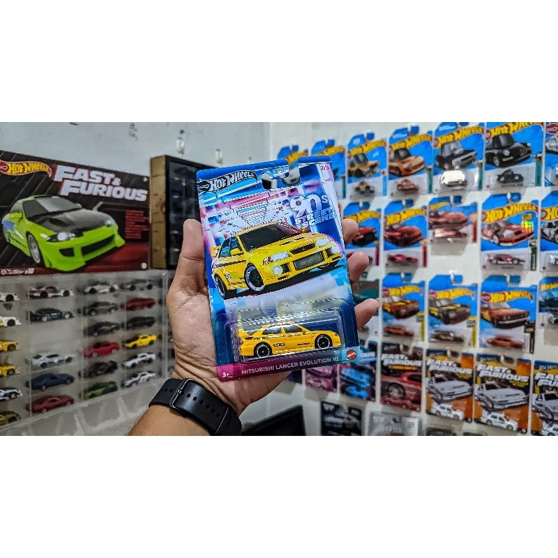 Jual hotwheels mitsubishi lancer evolution vi kuning series 90s ...