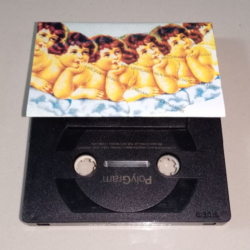 Jual Kaset The Cure - Japanese Whispers (COVER REPRO ISI ORI) | Shopee ...