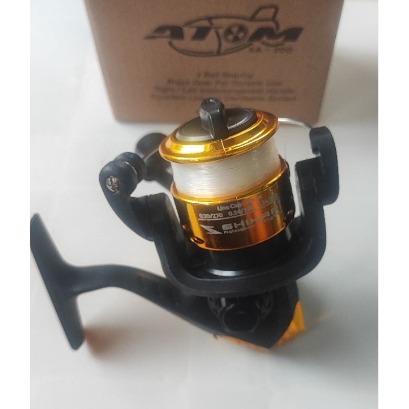 Jual Reel Pancing Spinning SHIKARI ATOM SA - 200 Bahan Plastik GRATIS ...