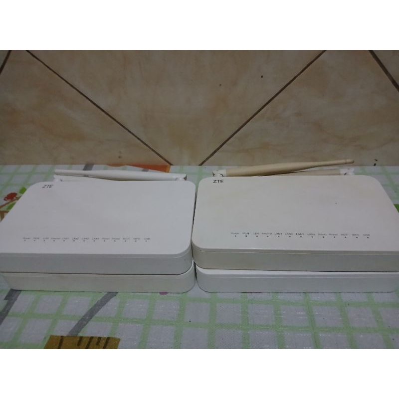 Jual modem zte 609 v3 phort biru plus adaptor | Shopee Indonesia