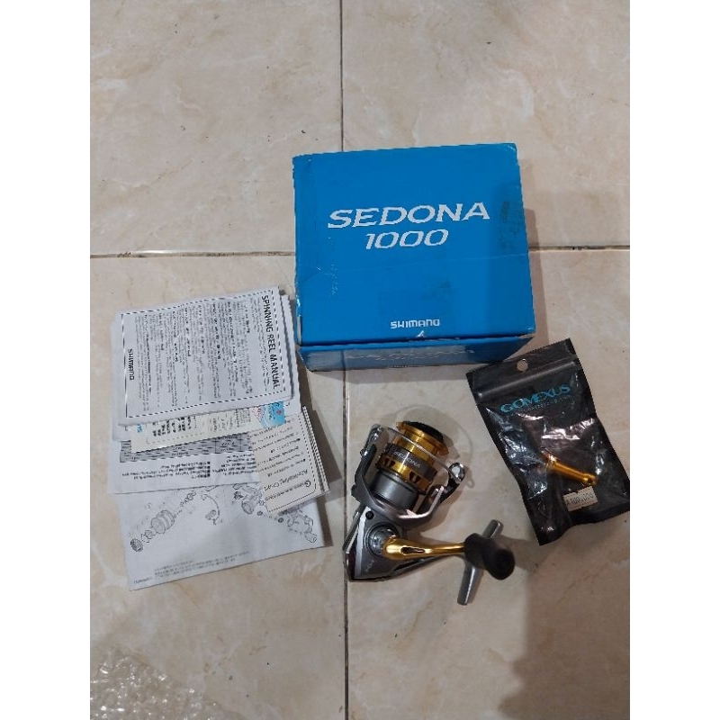 Jual reel shimano sedona 1000 lengkap free reelstand gomexus | Shopee Indonesia
