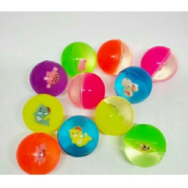 Jual Mainan anak bola bekel kecil ukuran 3cm ada isian boneka kecil di dalamnya lucu murah harga ...