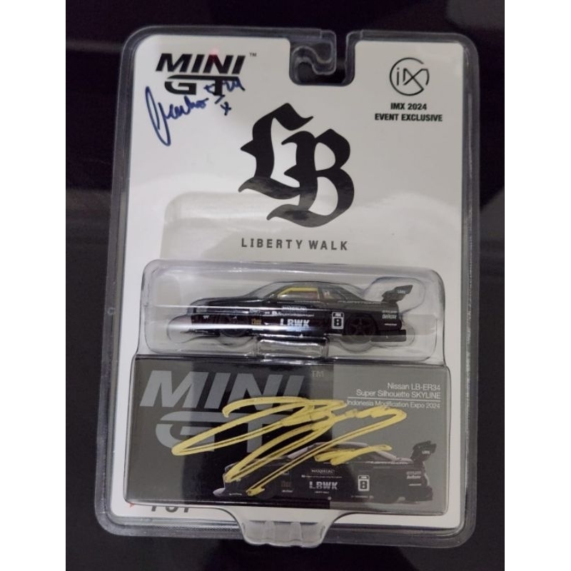 Jual Mini GT Nissan Skyline ER34 black Carbon IMX event sign om Prabuss ...