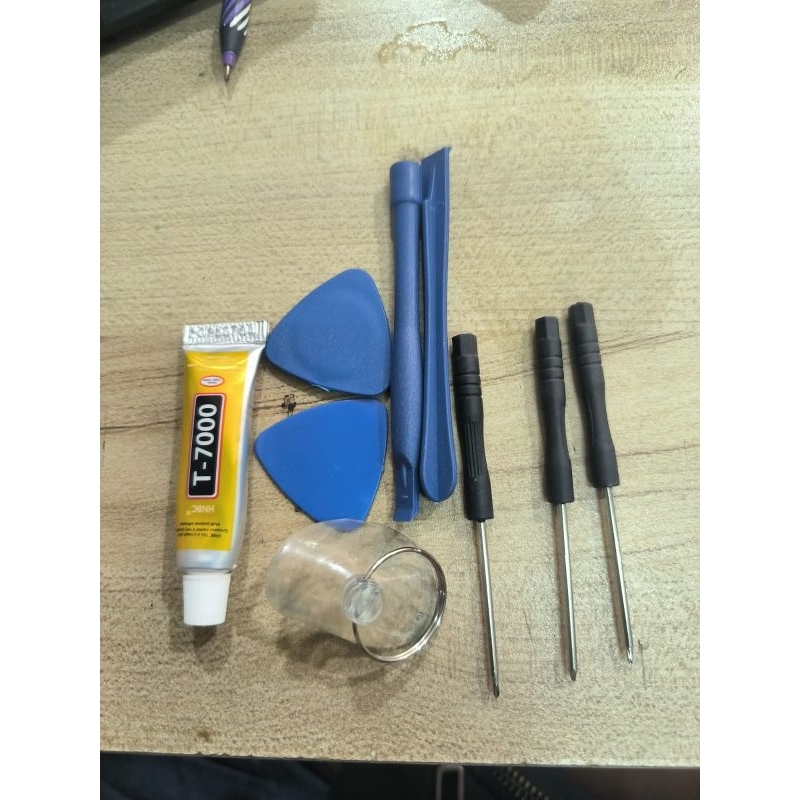 Jual TOOLS OBENG PEMBUKA HP PLUS LEM LCD TOUCHSCREEN T7000 3ML | Shopee Indonesia