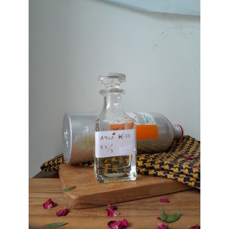 Jual parfum bibit aqua kiss 10 ml free botol kaca cantik | Shopee Indonesia