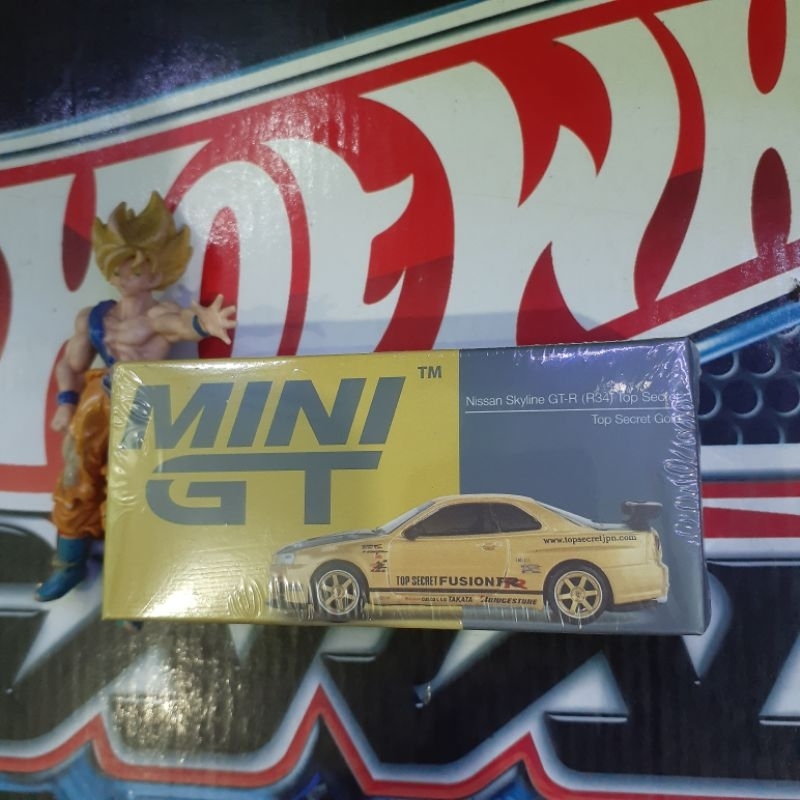 Jual Mini GT Nissan Skyline GT-R R34 Top Secret gold 676 sealed box ...