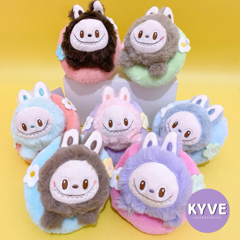 Jual Labubu Drifting on a cozy daisy-decorated floating theme keychain ...