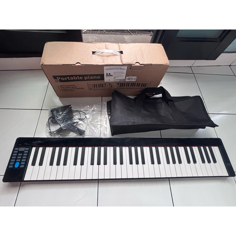 Jual Portable foldable Electric piano 61 tuts (piano lipat) | Shopee ...