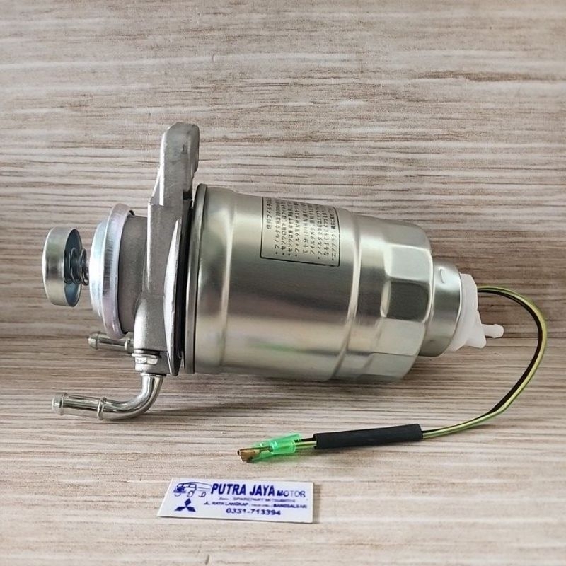 Jual Head Fuel Filter Assy Traga/NKR71 Pompa Filter Solar Komplit ...