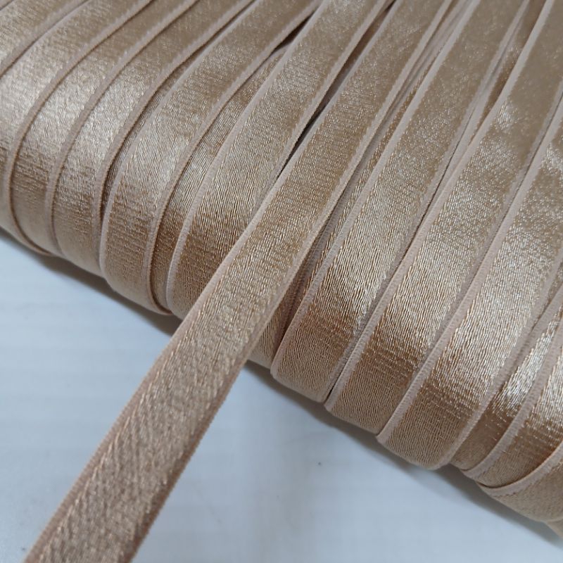 Jual tali karet bra krem 1 cm.per meter. | Shopee Indonesia