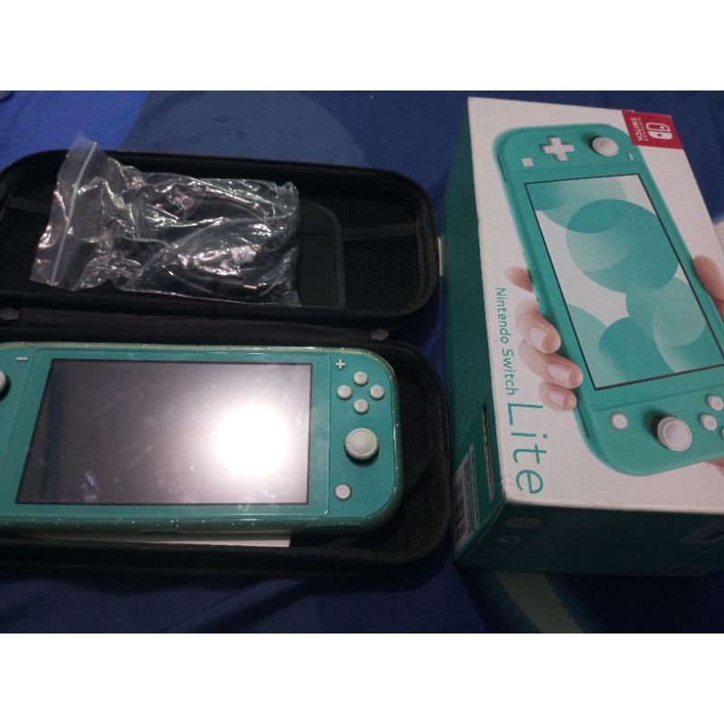 Jual NINTENDO SWITCH LITE TURQUOISE SECOND | Shopee Indonesia