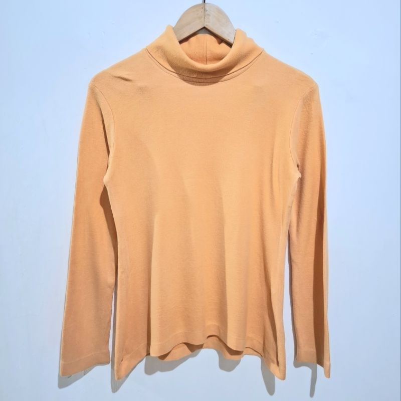 Jual Inner Fleece Uniqlo Light Orange (L) | Shopee Indonesia