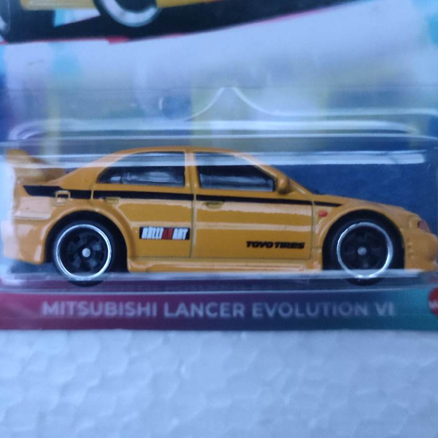 Jual HotWheels 90s Street Scene Mitsubishi Lancer Evolution Kuning ...