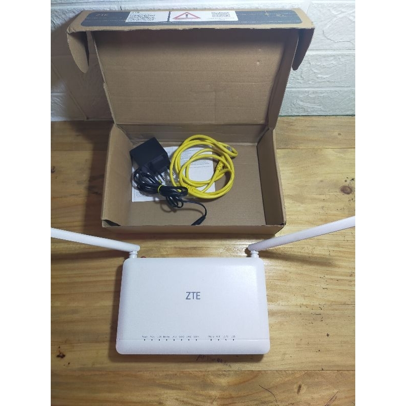 Jual zte f607L + adaptor 12v 1a original port hijau geser gambar baca ...
