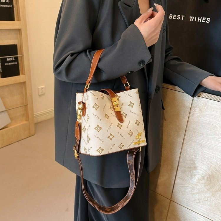 Jual T-209906 TAS WANITA FASHION PORTABLE PUITH RITSLETING LOGAM TAS ...