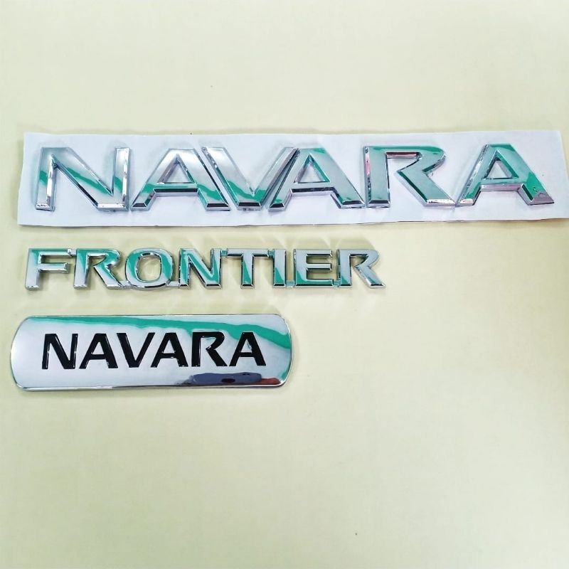 Jual Emblem logo NAVARA FRONTIER FENDER nissan ukuran original bak ...
