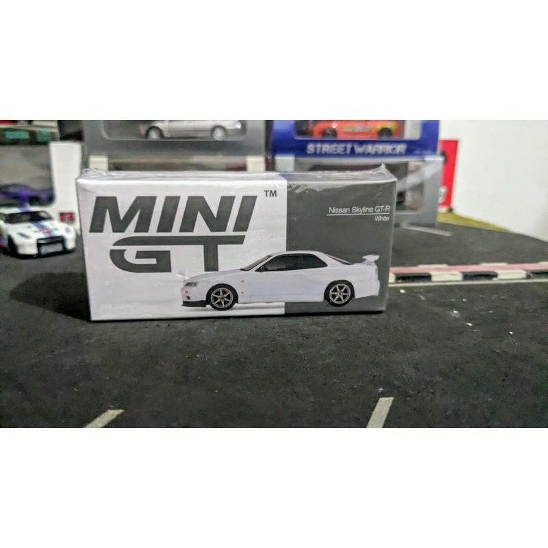 Jual Diecast Mini GT Nissan Skyline GTR R34 White no 397 Segel | Shopee ...