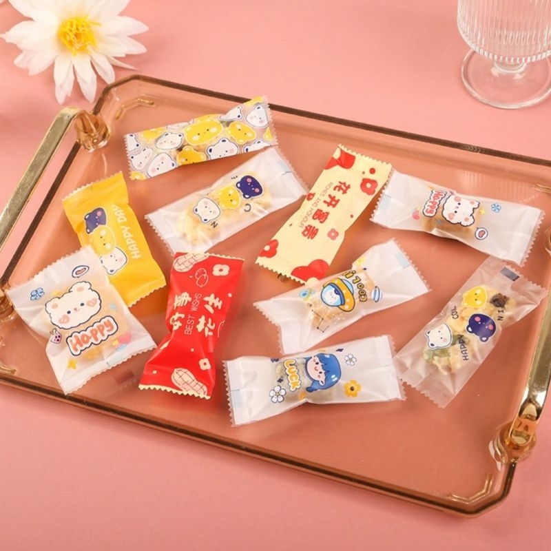 Jual 100 Pcs Plastik Permen Lucu Nougat uk.4x9,5cm Plastik Sealer Opp ...