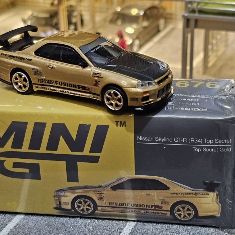 Jual mini gt nissan skyline GTR R34 Top Secret Gold 676 r32 431 inno ...