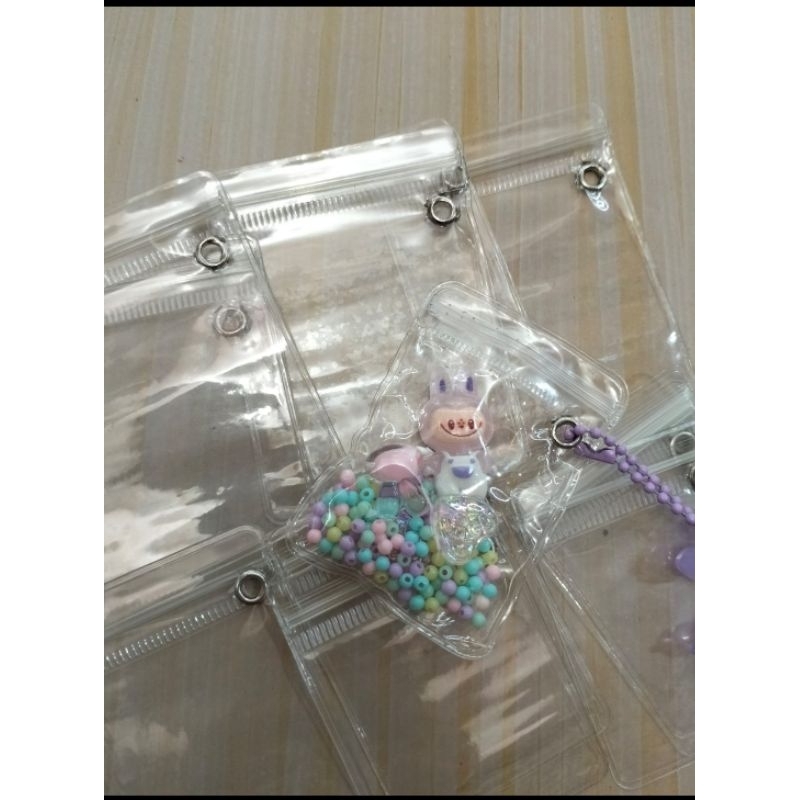 Jual Pouch Mini PCV dengan lubang untuk gantungan kunci isi 5 pcs ...