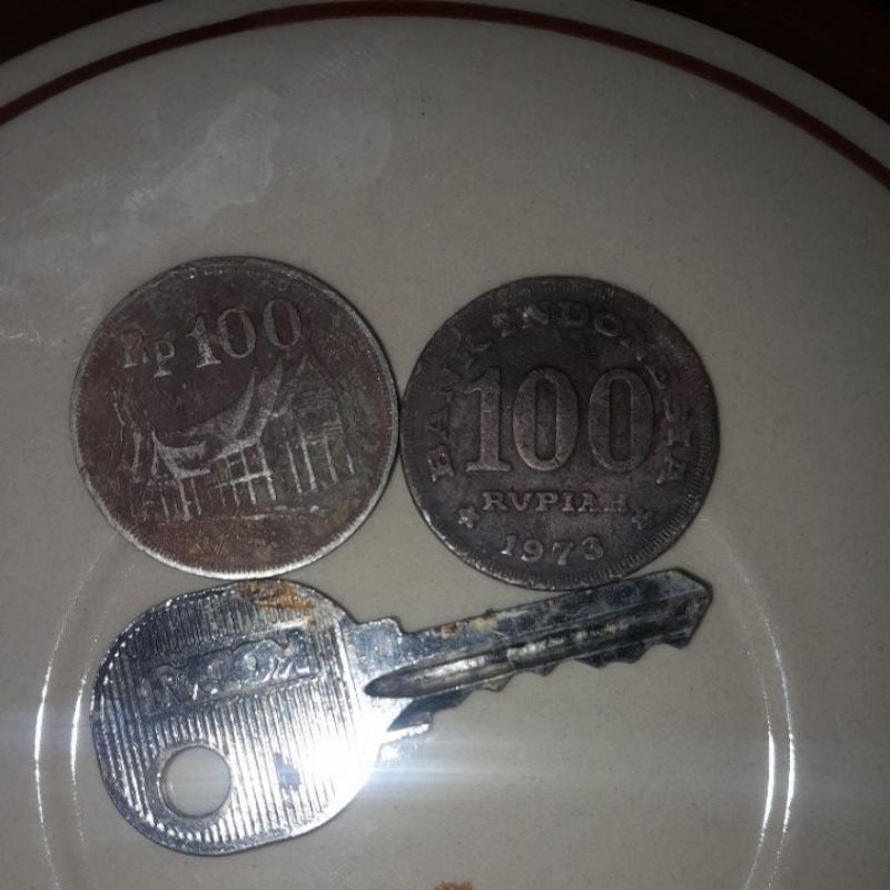 Jual uang koin 100 perak gambar rumah adat dan 1000 rupihah kelapa ...