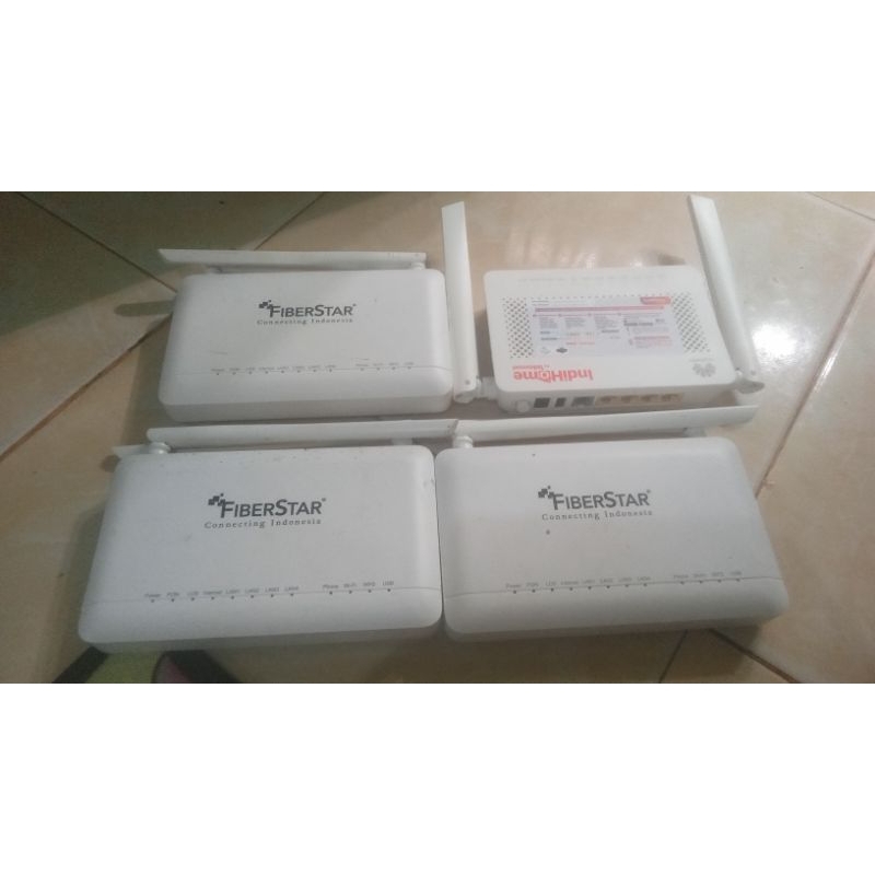 Jual router modem ZTE f609 cbn fiberstar 3 unit & 5V5 port biru ...