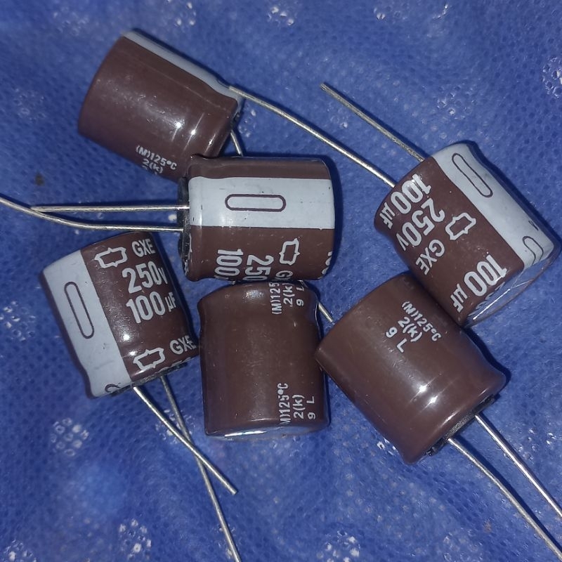 Jual kapasitor NIPPON ORIGINAL 100uf 250v elko elco capasitor 100 uf 250 v 100uf/250v 100/250 ...