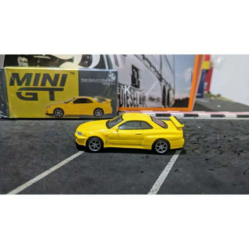 Jual Diecast Mini GT Nissan Skyline GTR R34 VSpec Lightning Yellow no ...